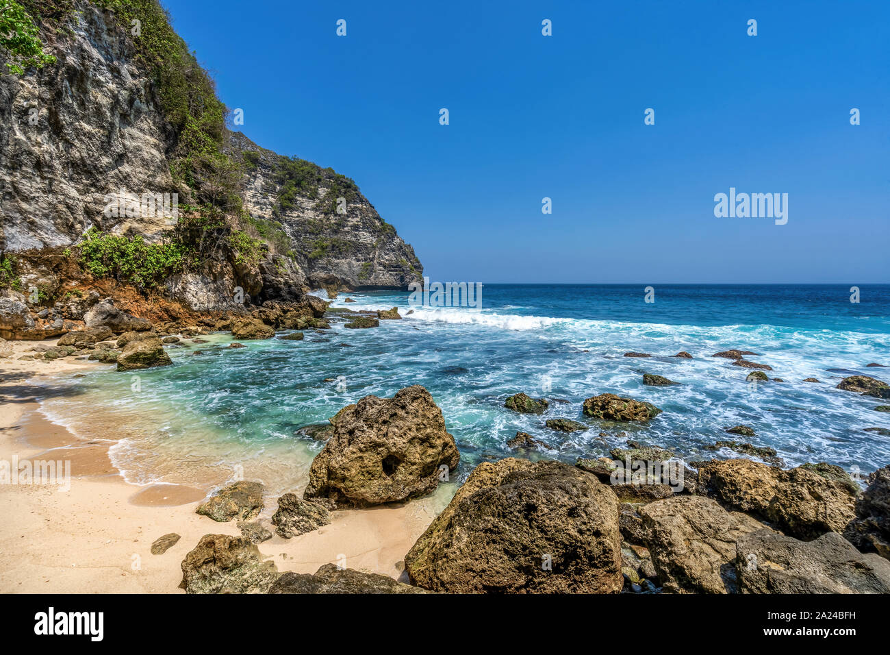 Beach and cave at Tembeling beach, at Nusa Penida Island, Bali ...