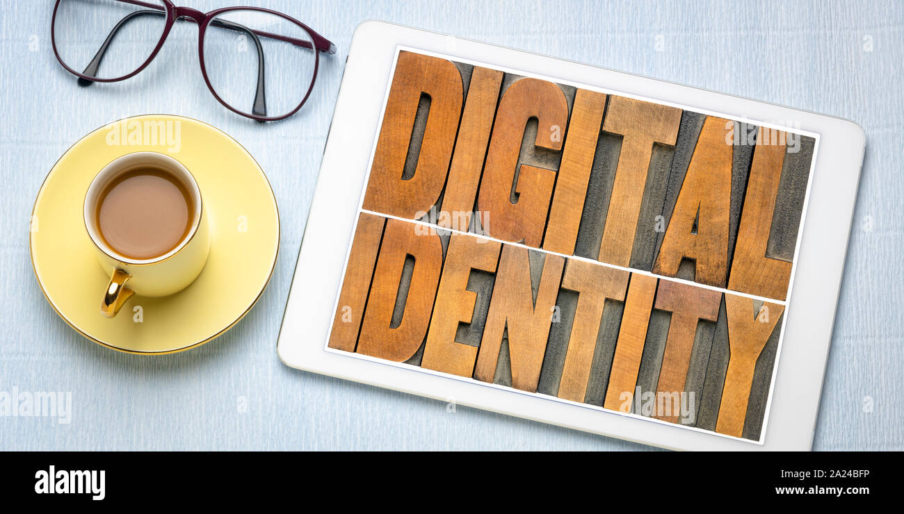 digital identity concept - word abstract in letterpress wood type on a ...
