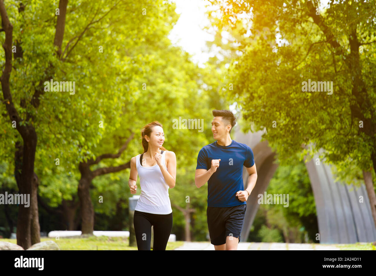 Running jogging at the park hi-res stock photography and images - Alamy