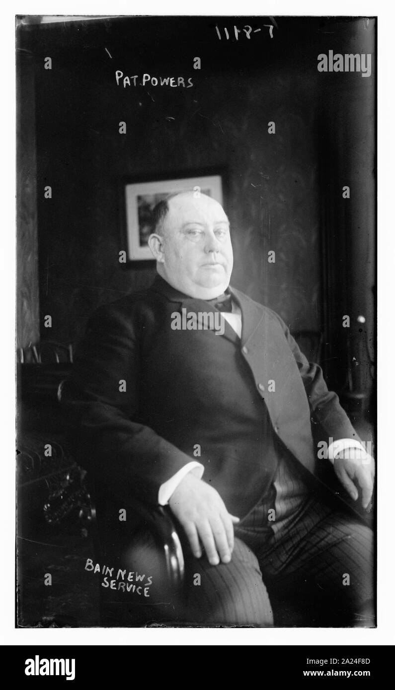 Pat Powers seated Stock Photo - Alamy