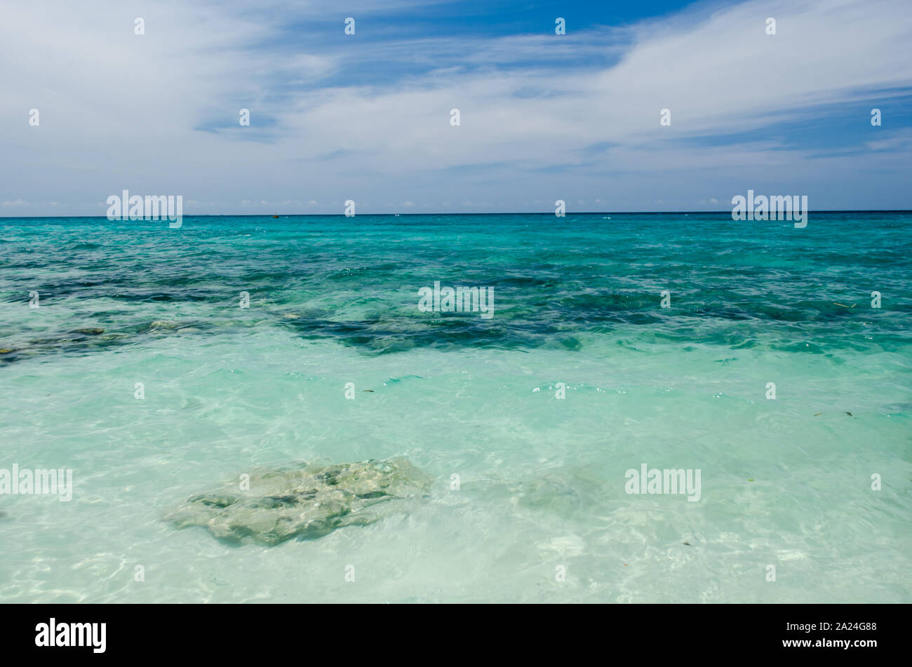 Turquoise sea around tropical island hi-res stock photography and ...