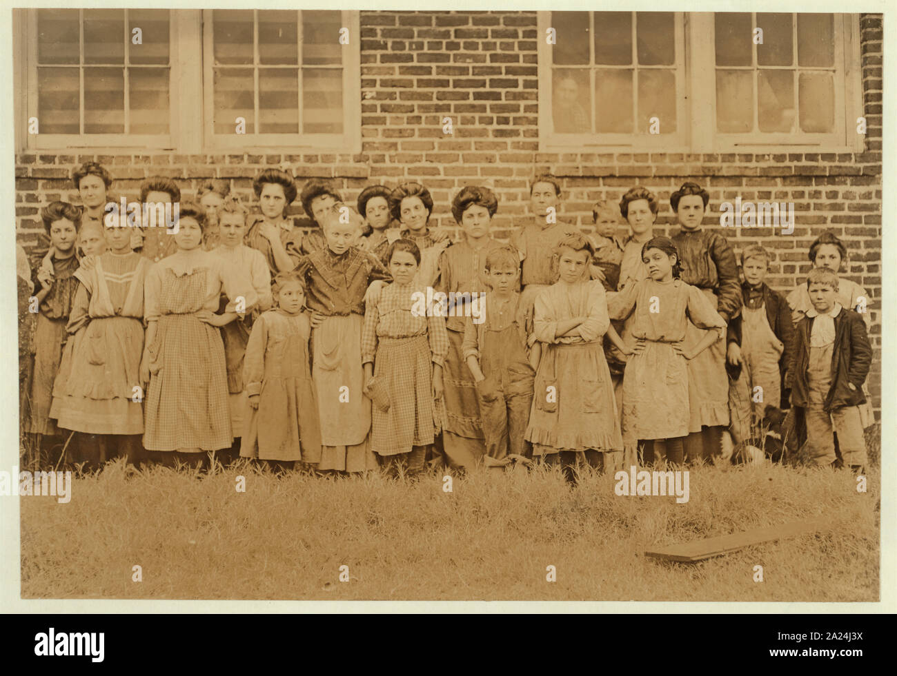 Payne Cotton Mill, Macon, Ga. See photo and label 538. Girl with dropping eyes and hands on hips ...