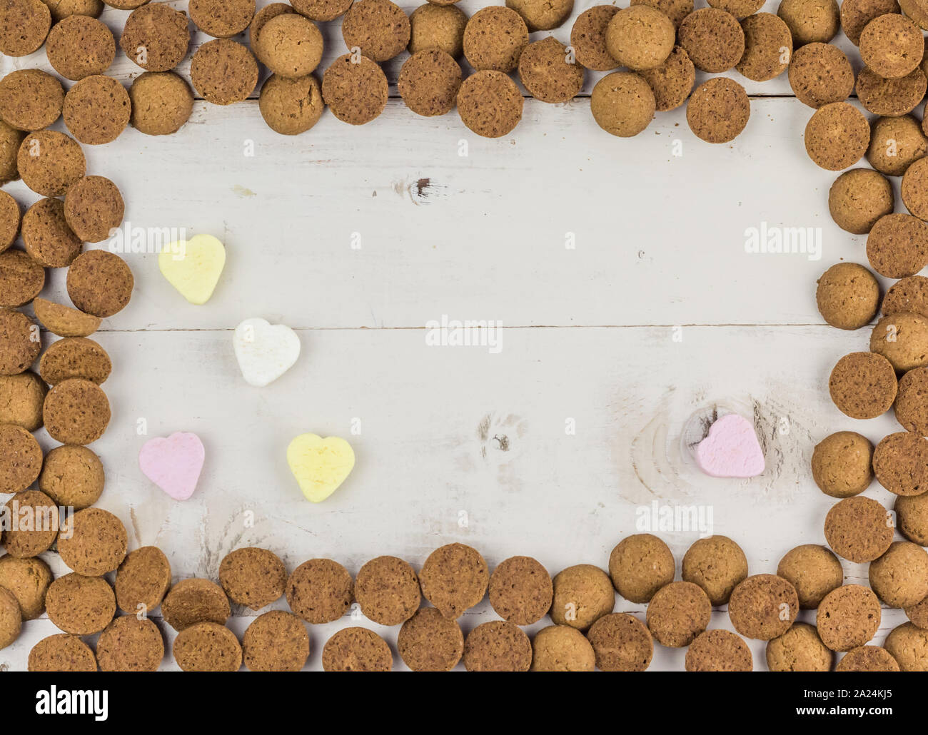 Frame of gingernuts and heart shaped candy for traditional dutch ...