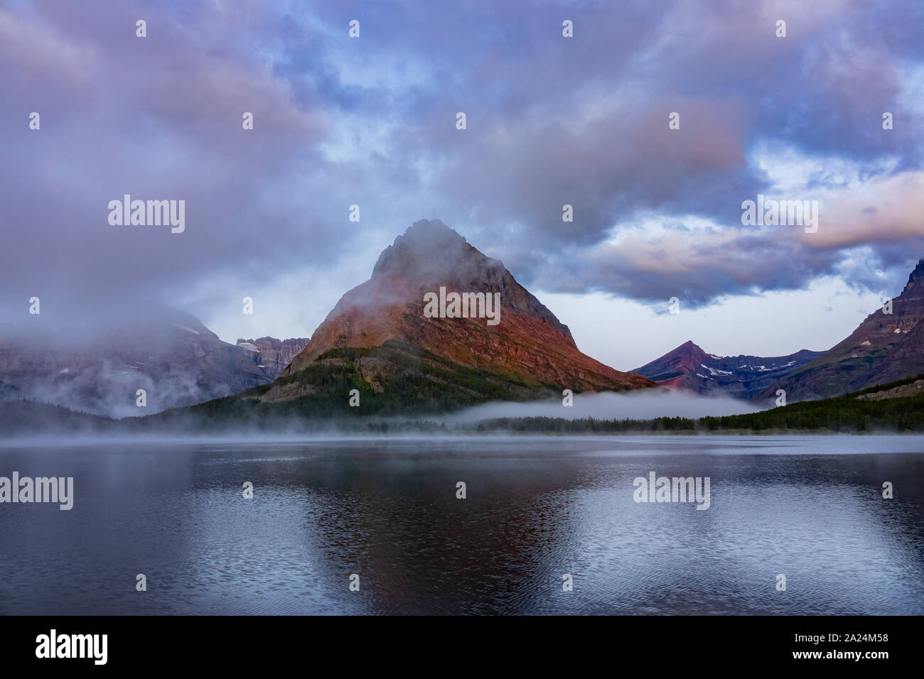 Sunrise of the Mount Wilbur, Swiftcurrent Lake in the Many Glacier area ...