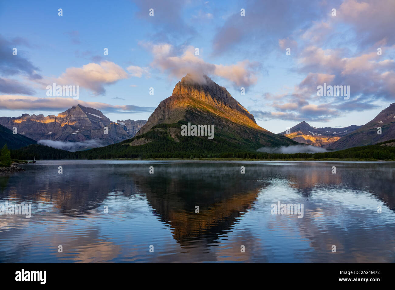 Sunrise of the Mount Wilbur, Swiftcurrent Lake in the Many Glacier area ...