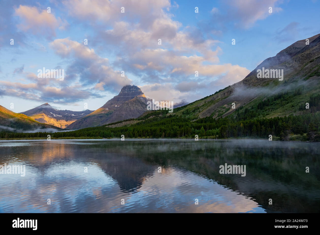 Sunrise of the Mount Wilbur, Swiftcurrent Lake in the Many Glacier area ...