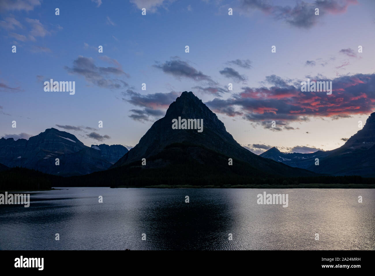 Sunset view of the Mount Wilbur, Swiftcurrent Lake in the Many Glacier ...