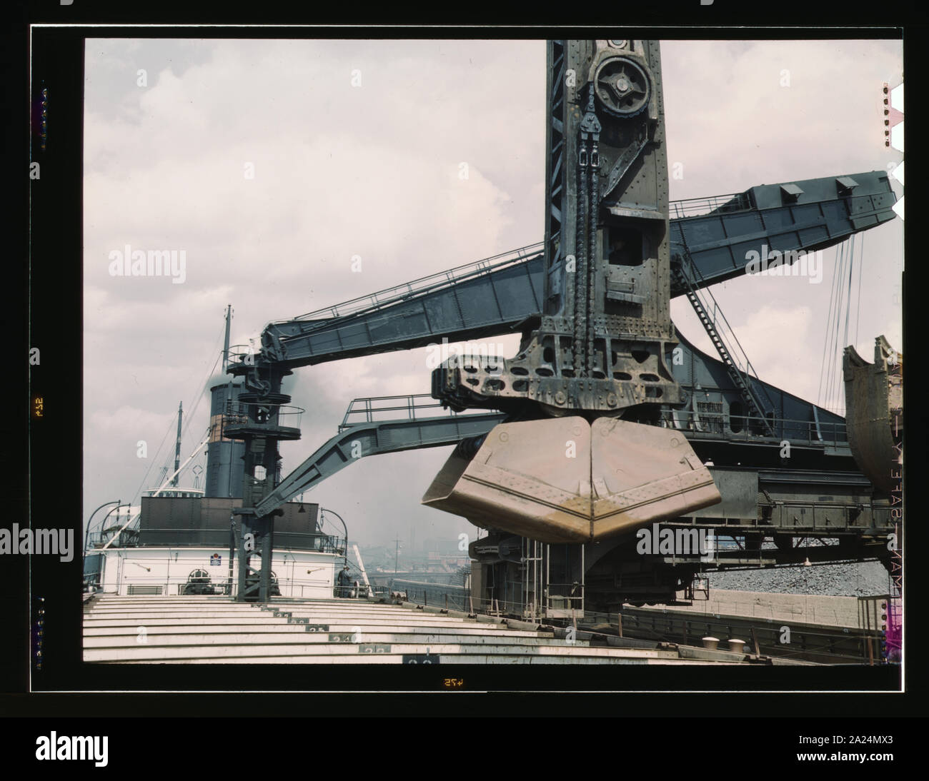 Pennsylvania R.R. ore docks, unloading iron ore from a lake freighter ...