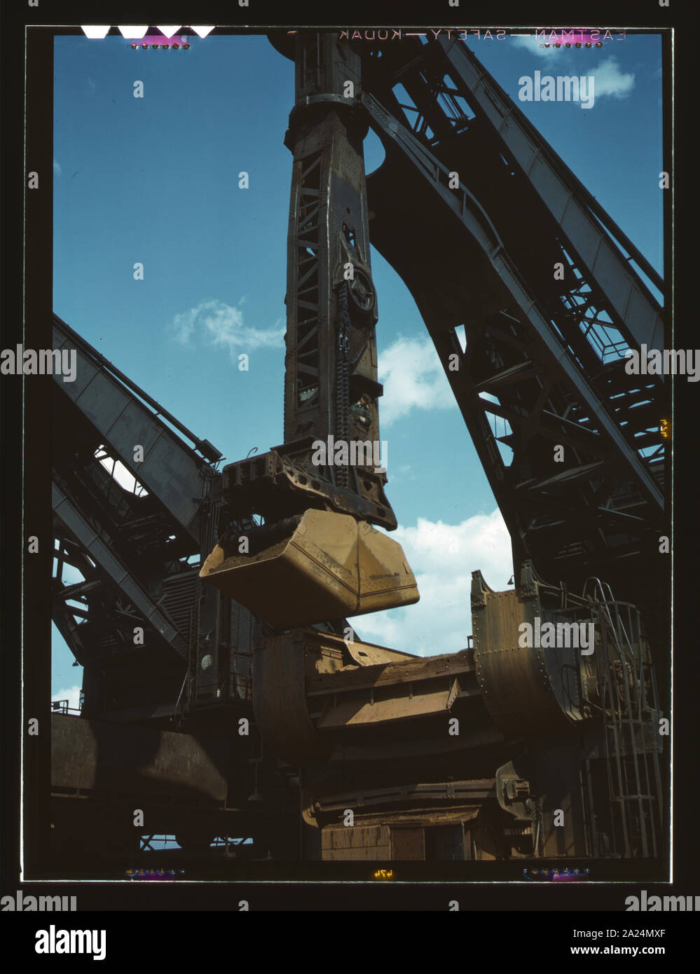 Pennsylvania R.R. ore docks, a Hulett ore unloader in operation ...