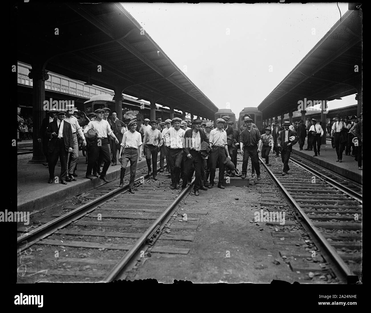 People at train tracks Stock Photo - Alamy