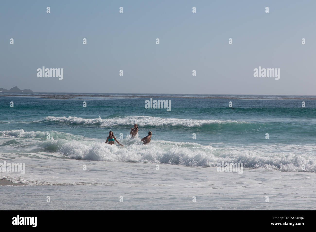 People in surf, Carmel-by-the-Sea, Monterey, California Stock Photo - Alamy