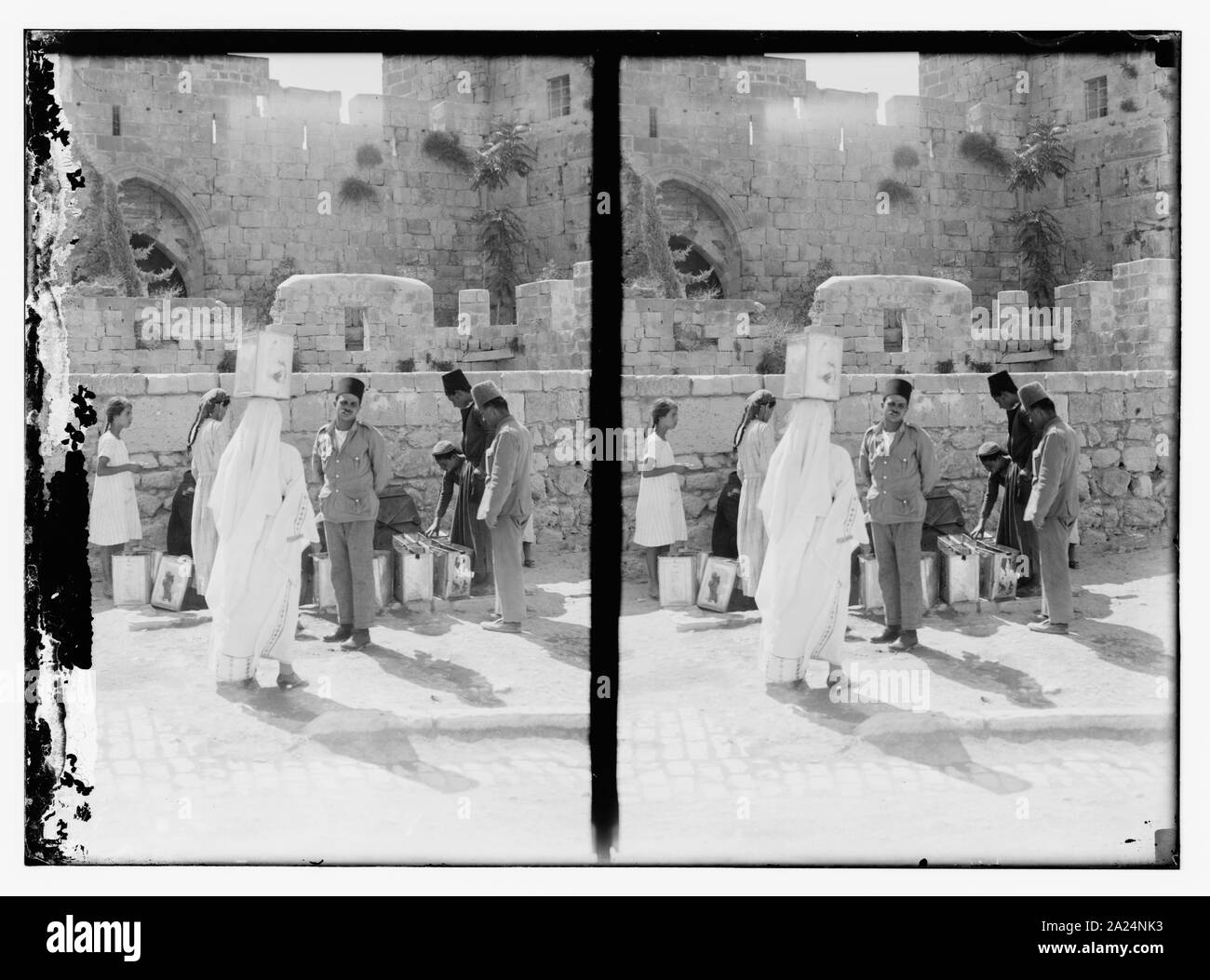 People getting water at fountain Stock Photo - Alamy