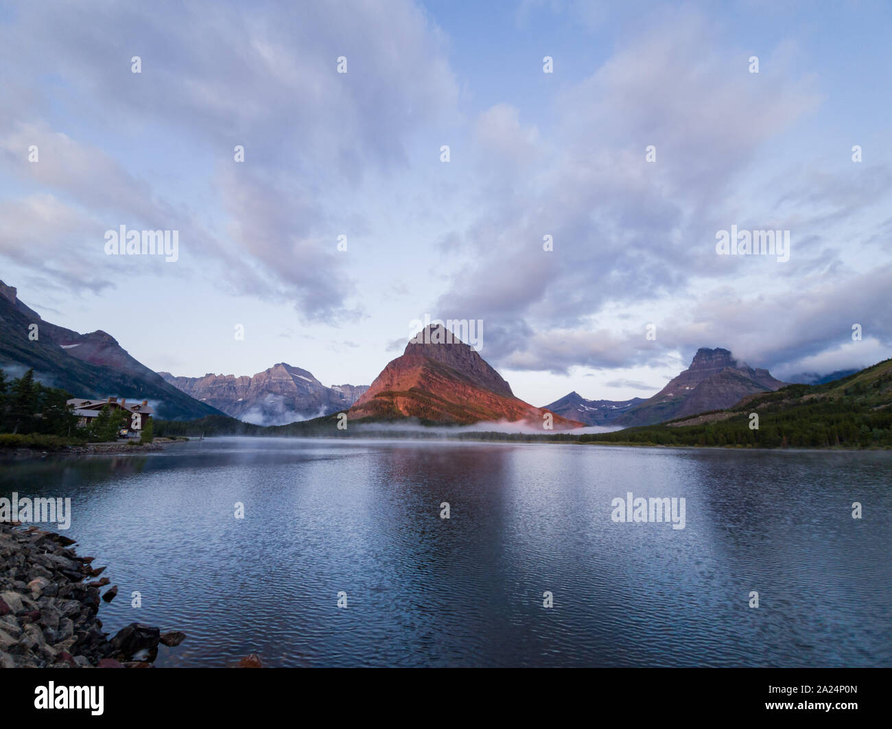 Sunrise of the Mount Wilbur, Swiftcurrent Lake in the Many Glacier area ...
