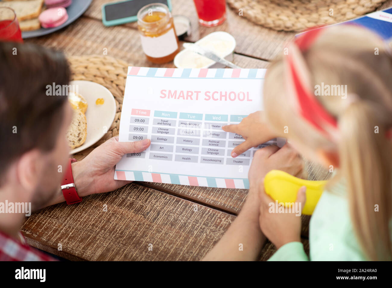 Daughter bringing her schedule to daddy before heading to school Stock ...