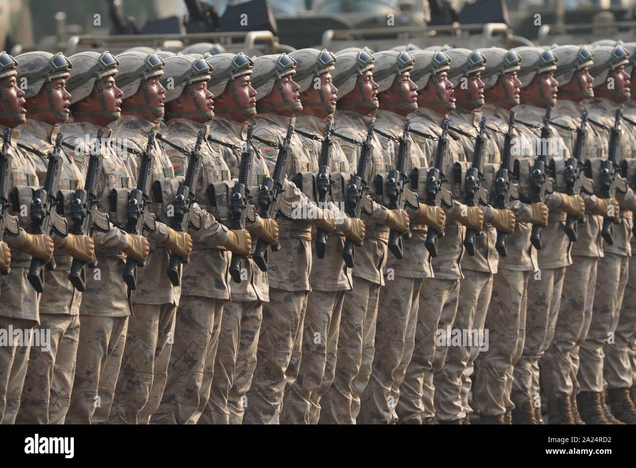 Beijing, China. 1st Oct, 2019. Military personnel of light armored ...
