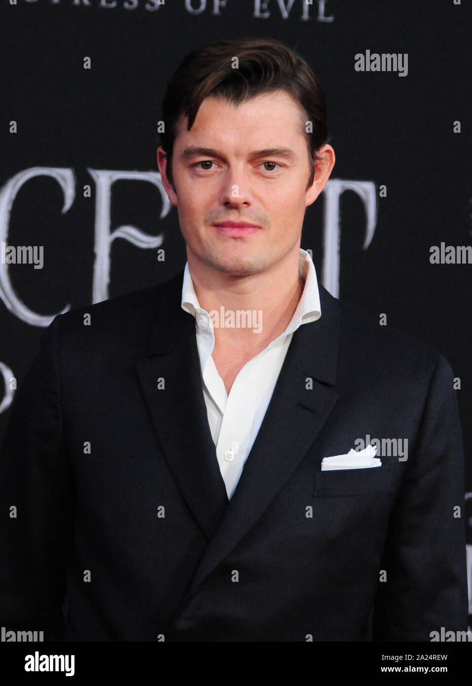 Sam riley angelina jolie maleficent hi-res stock photography and images ...