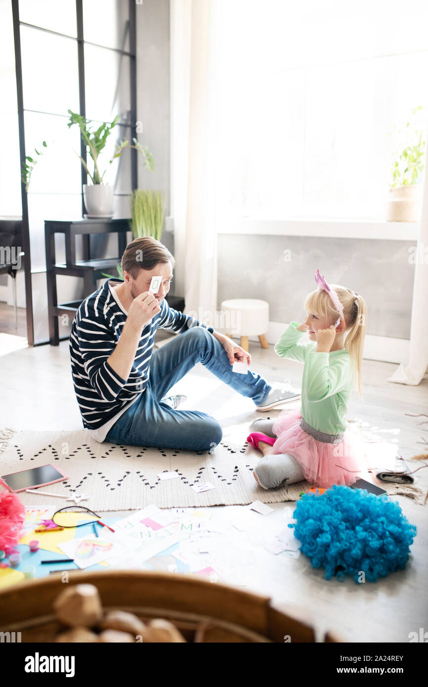 Sitting on letters hi-res stock photography and images - Alamy