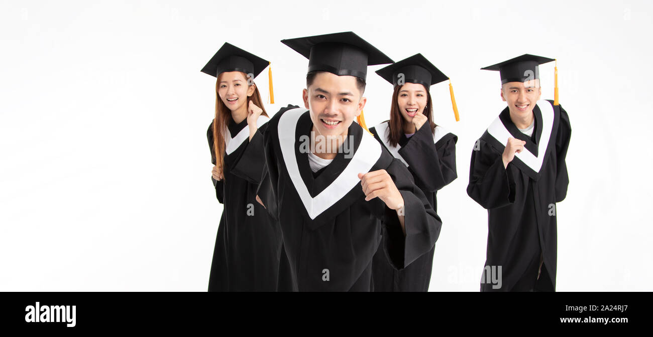 Group of Students Running and Celebrating Graduation Stock Photo - Alamy