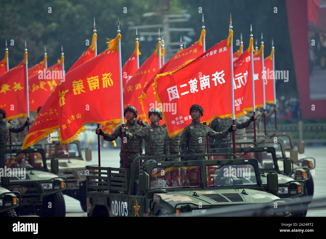 Beijing, China. 1st Oct, 2019. A formation of military flags takes part ...