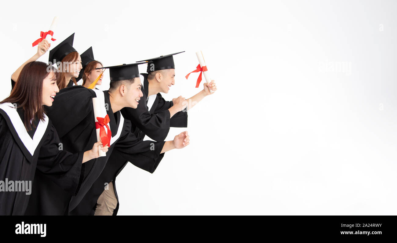 Group of Students Running and Celebrating Graduation Stock Photo - Alamy