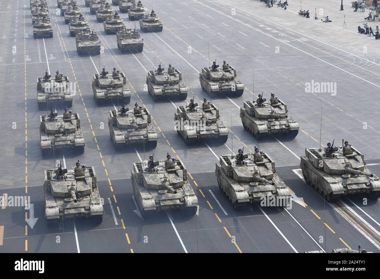 Beijing, China. 1st Oct, 2019. A tank formation takes part in a ...
