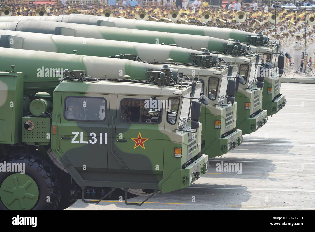 Beijing, China. 1st Oct, 2019. A formation of Dongfeng-26 conventional ...