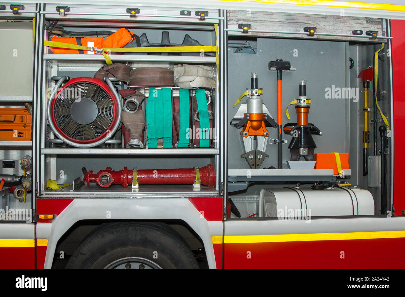 hoses tools and equipment of a Fire Truck Stock Photo - Alamy