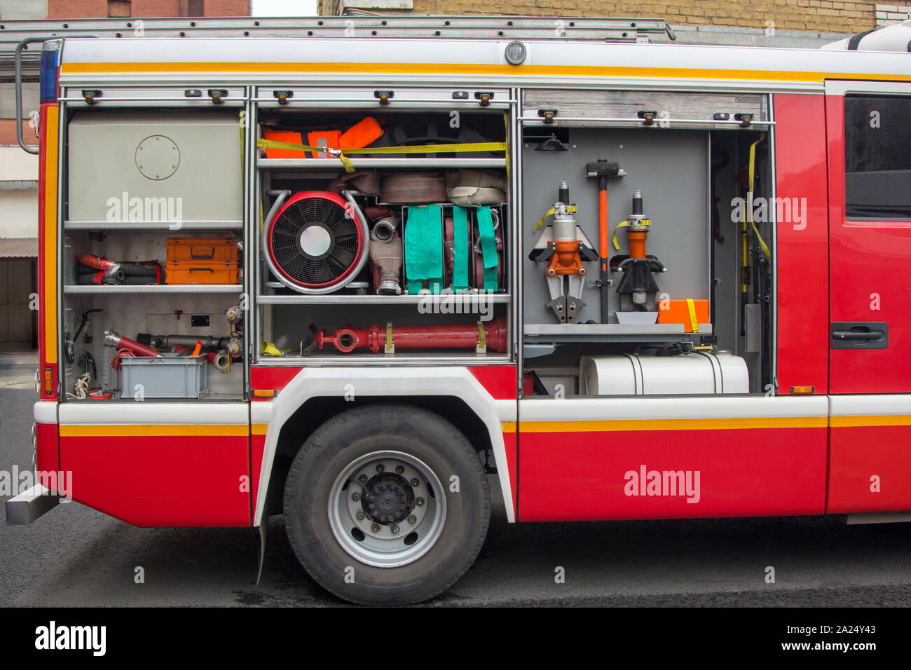 hoses tools and equipment of a Fire Truck Stock Photo - Alamy