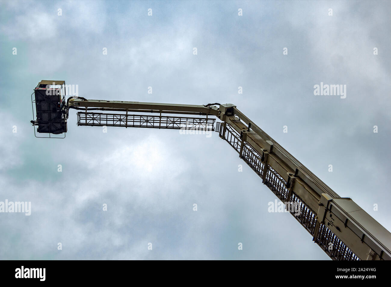 telescopic lift of a fire truck on sky background Stock Photo - Alamy