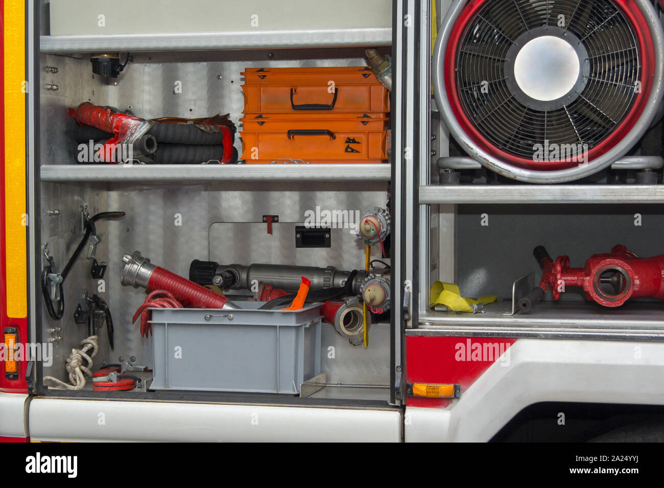 hoses tools and equipment of a Fire Truck Stock Photo - Alamy