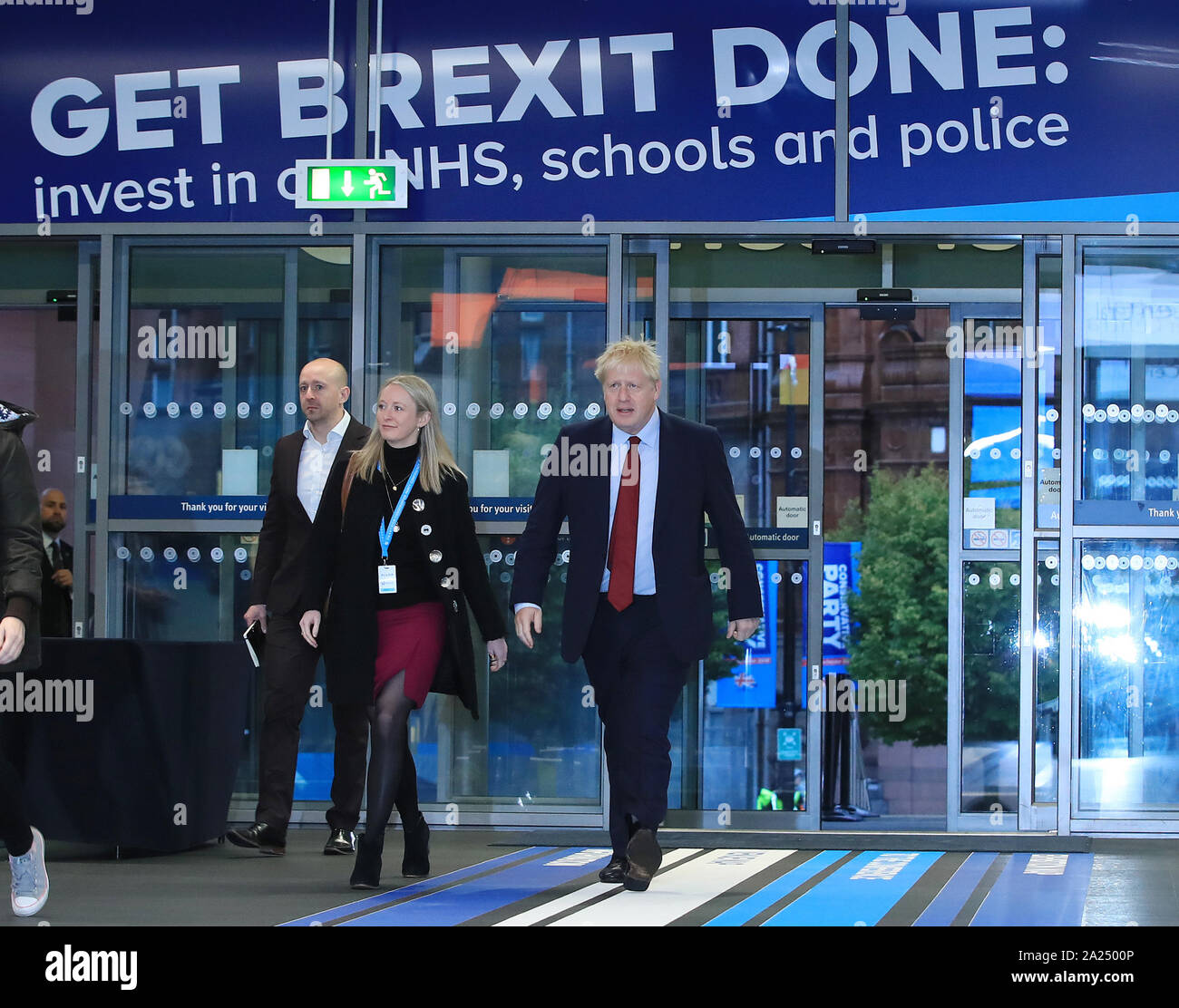 Prime Minister Boris Johnson enters the hall to do morning interviews ...
