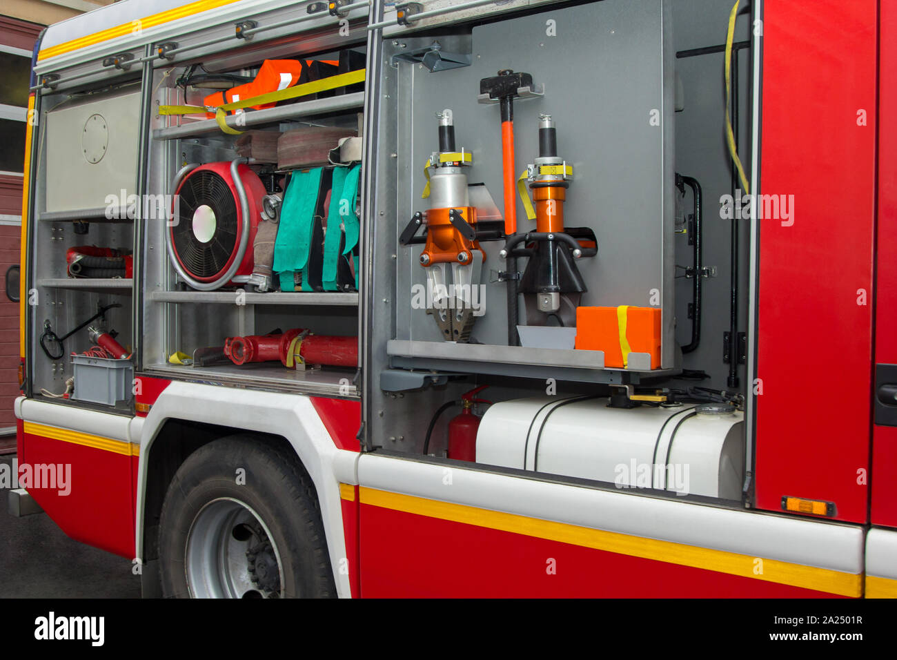 hoses tools and equipment of a Fire Truck Stock Photo - Alamy