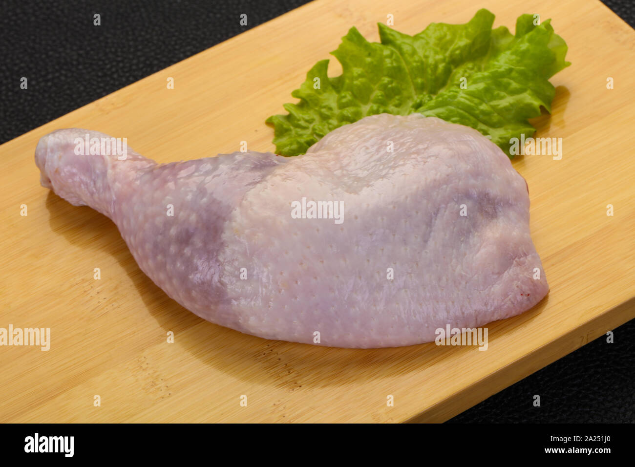 Raw chicken leg ready for cooking Stock Photo - Alamy
