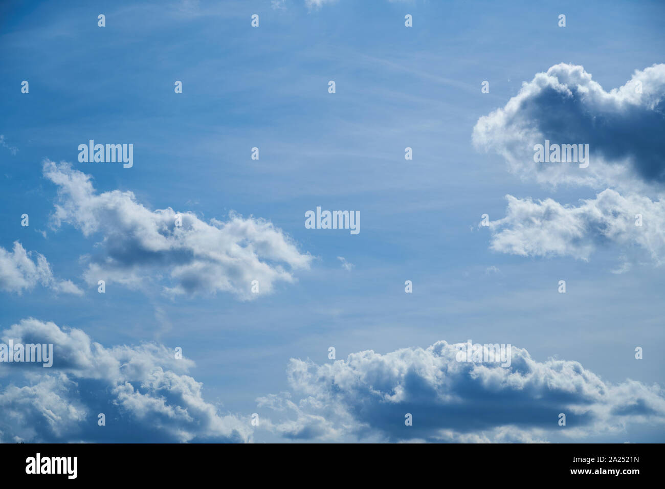 White clouds in blue sky for background Stock Photo - Alamy