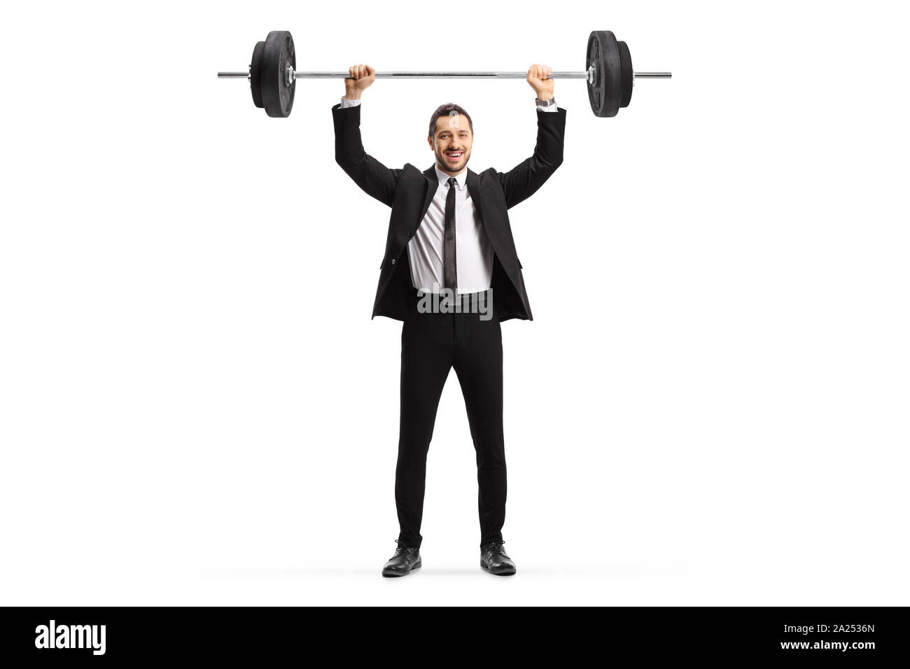 Full length portrait of a man in a suit lifting weights and smiling ...