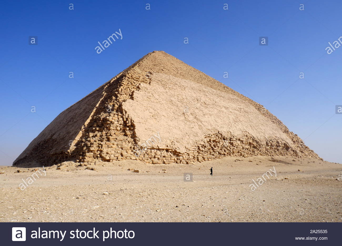 The Bent Pyramid is an ancient Egyptian pyramid located at the royal necropolis of Dahshur ...