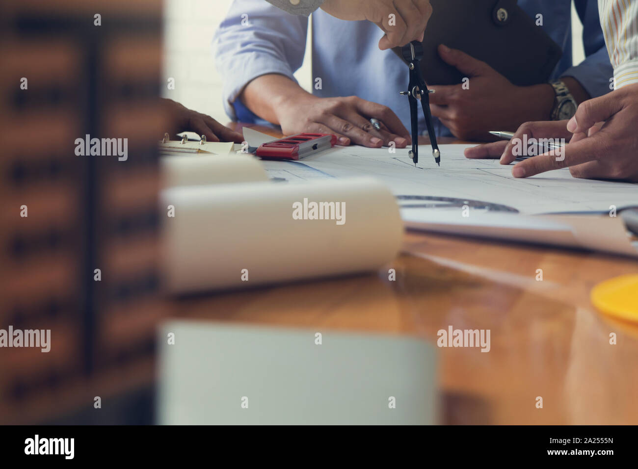 Engineer and Architect concept, Architects using circus with blueprint ...