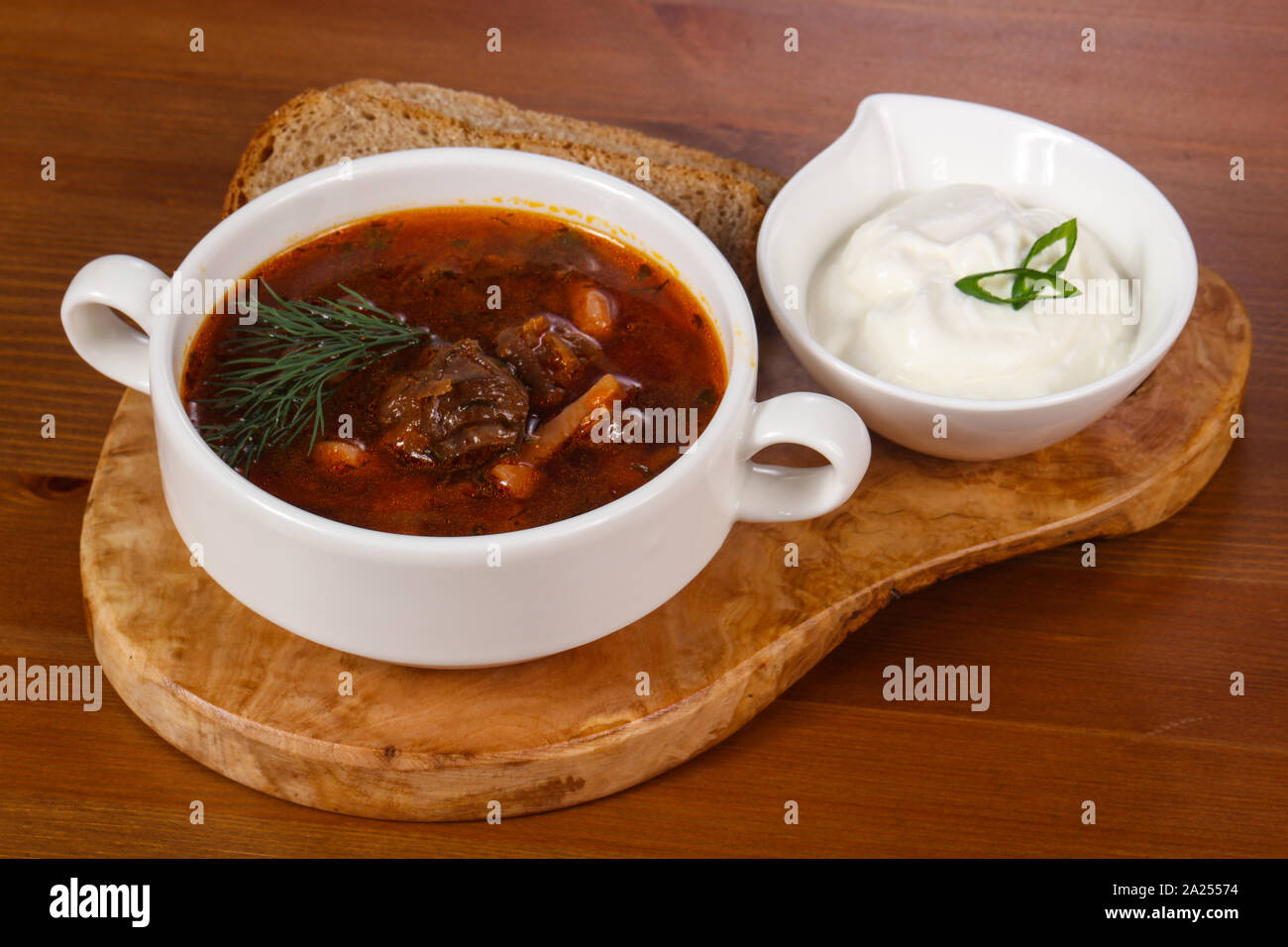 Traditional Russian borsch with beef and sour cream Stock Photo - Alamy