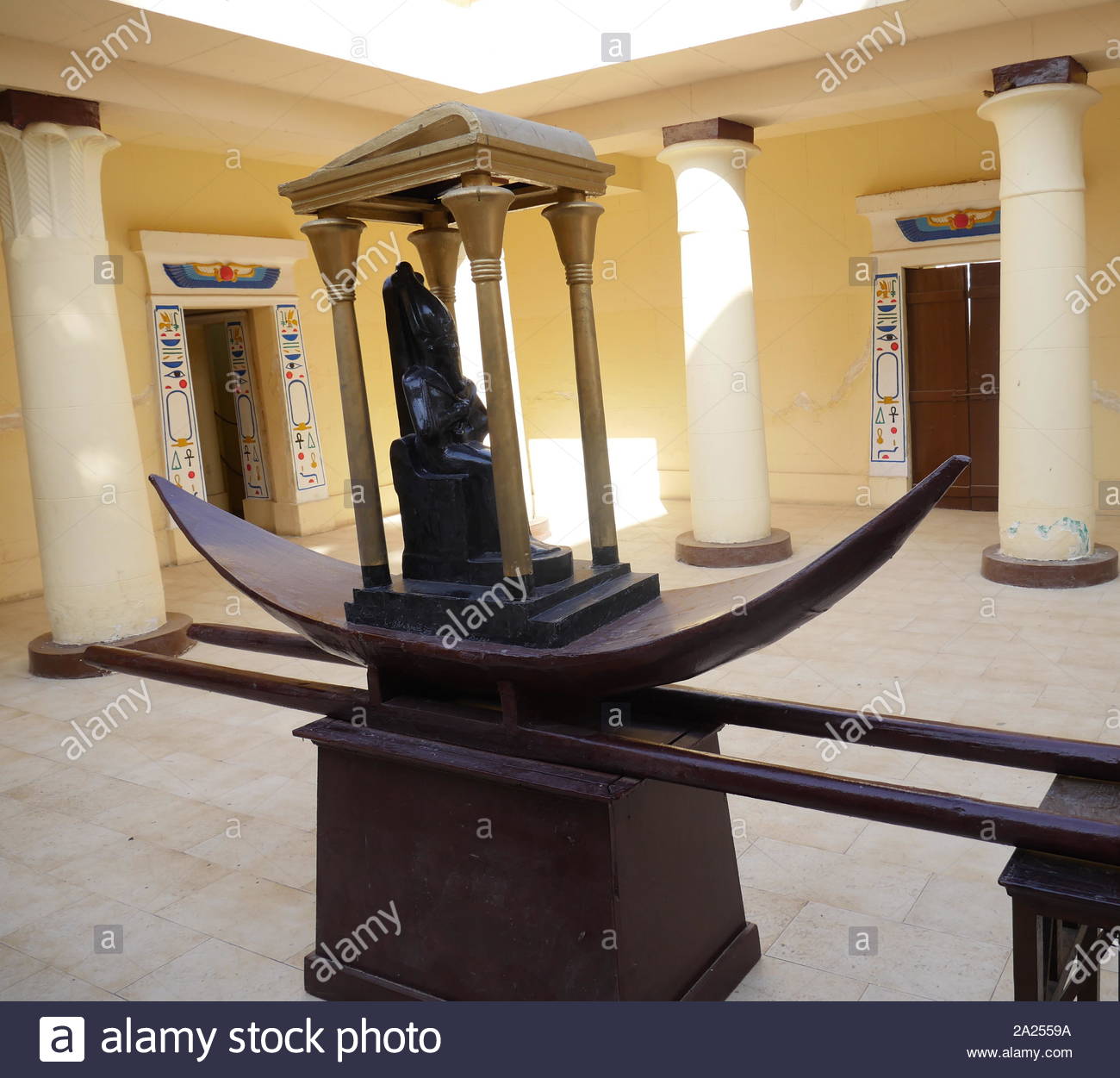 Reconstruction of a nobleman's house with litter carrying a figure of ...