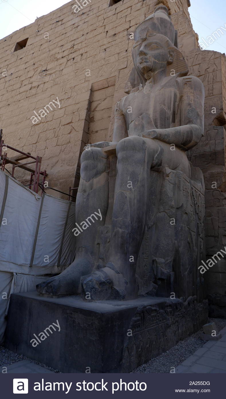 Rameses II statue at the entrance to the ancient Egyptian Luxor Temple ...