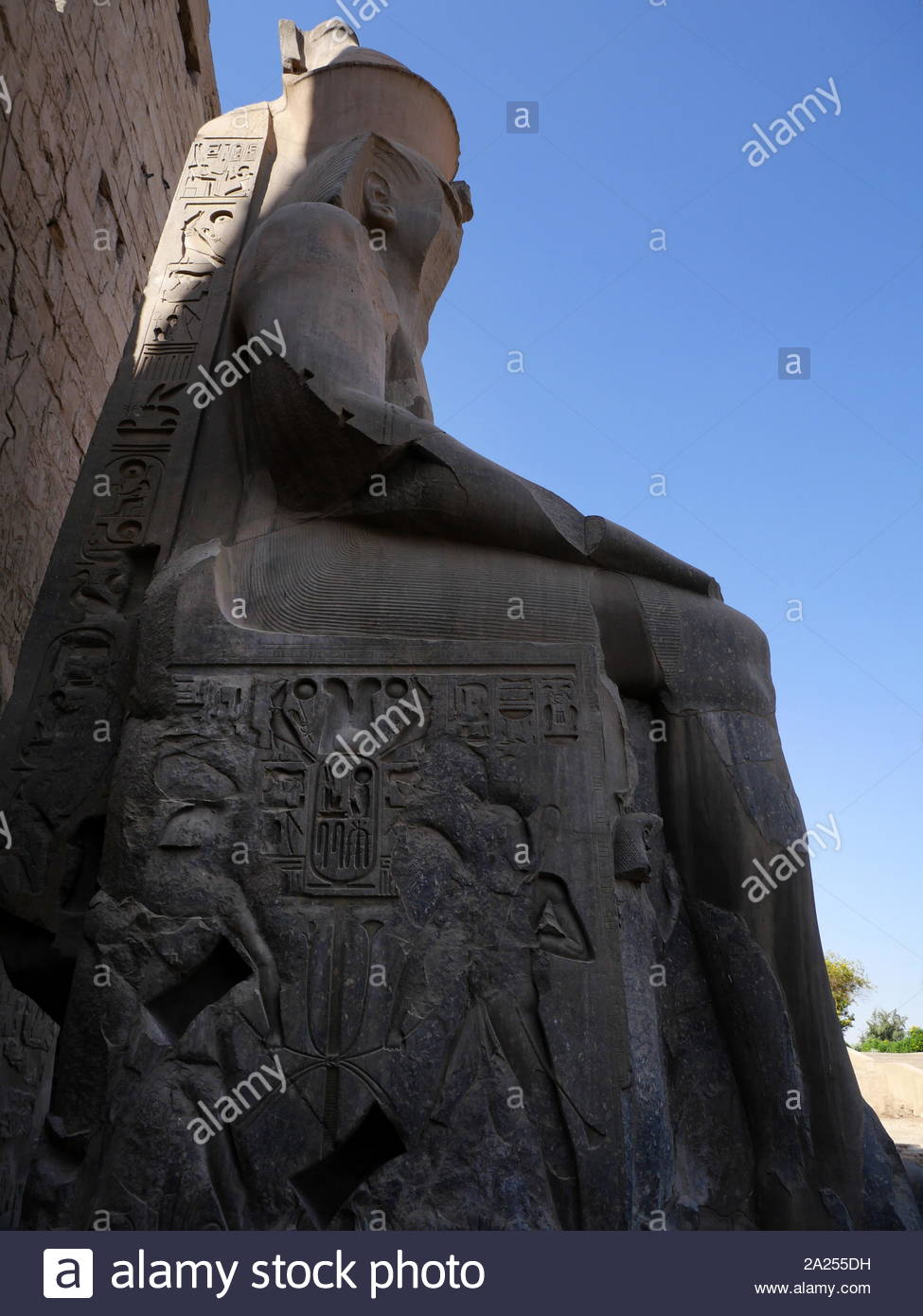 Rameses II statue at the entrance to the ancient Egyptian Luxor Temple ...
