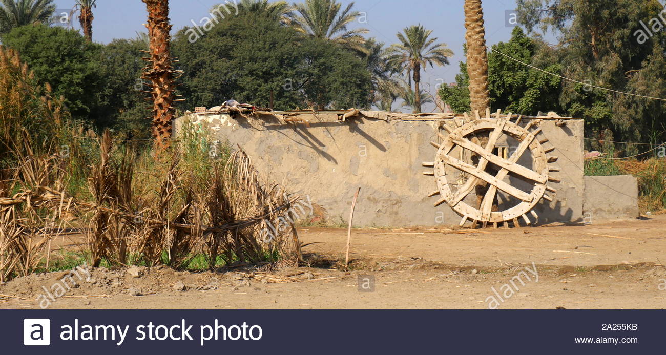 Replica of an ancient Egyptian village with wheel used in a mill to ...