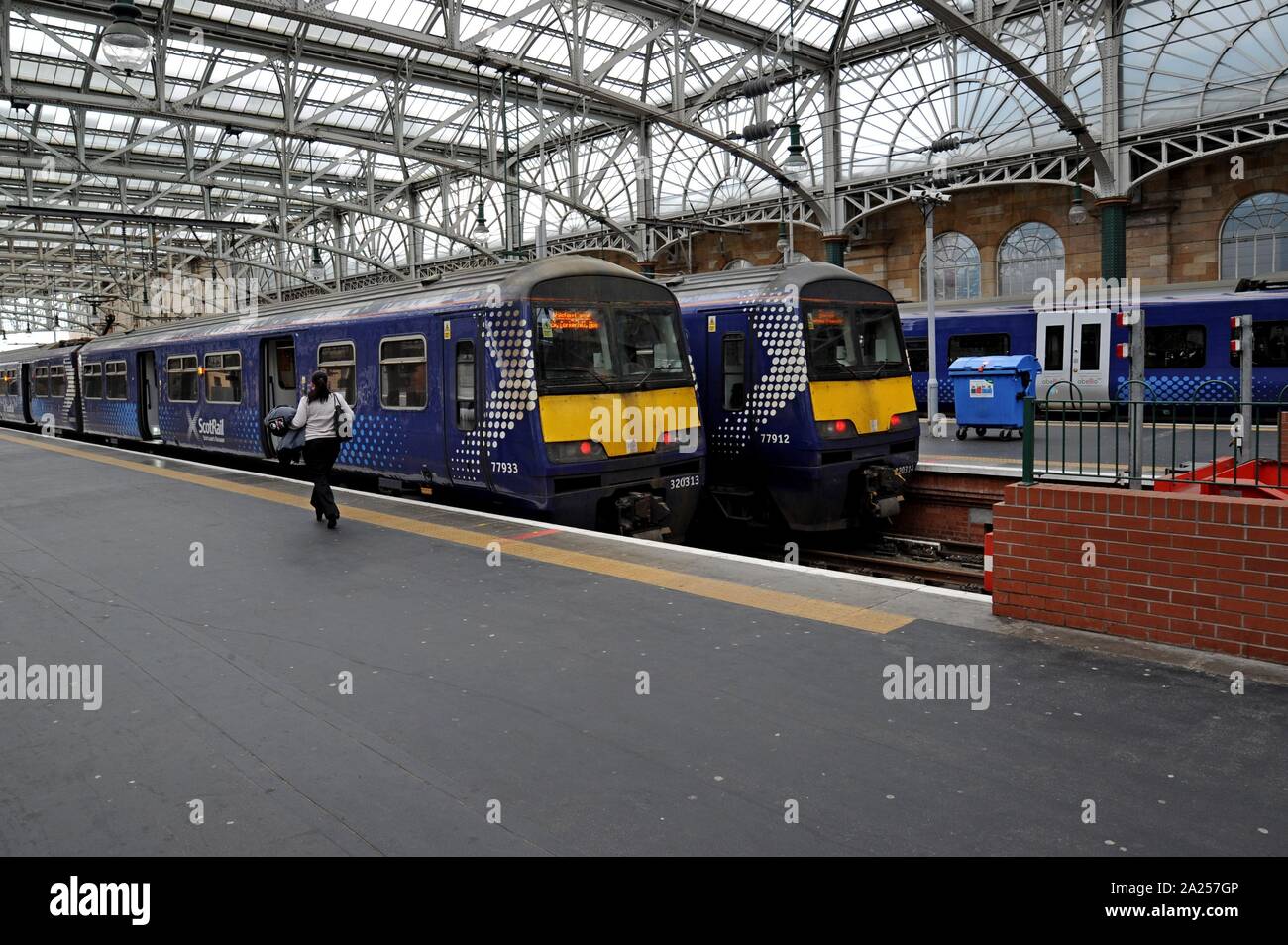 Passengers boarding Scotrail Class 320 electric trains at Glasgow ...