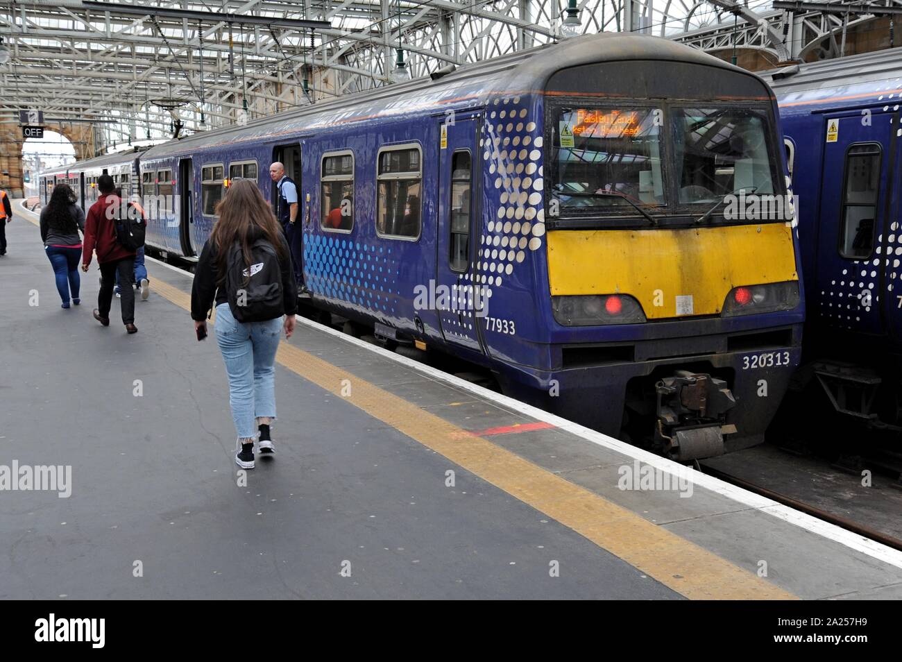 Passengers boarding Scotrail Class 320 electric trains at Glasgow ...