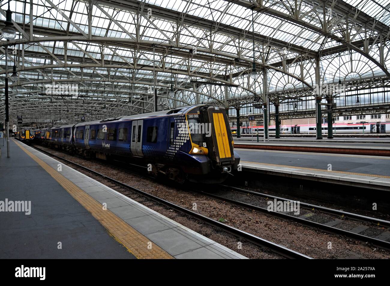 Scotrail Class 380 Desiro electric trains leaving Glasgow Central ...