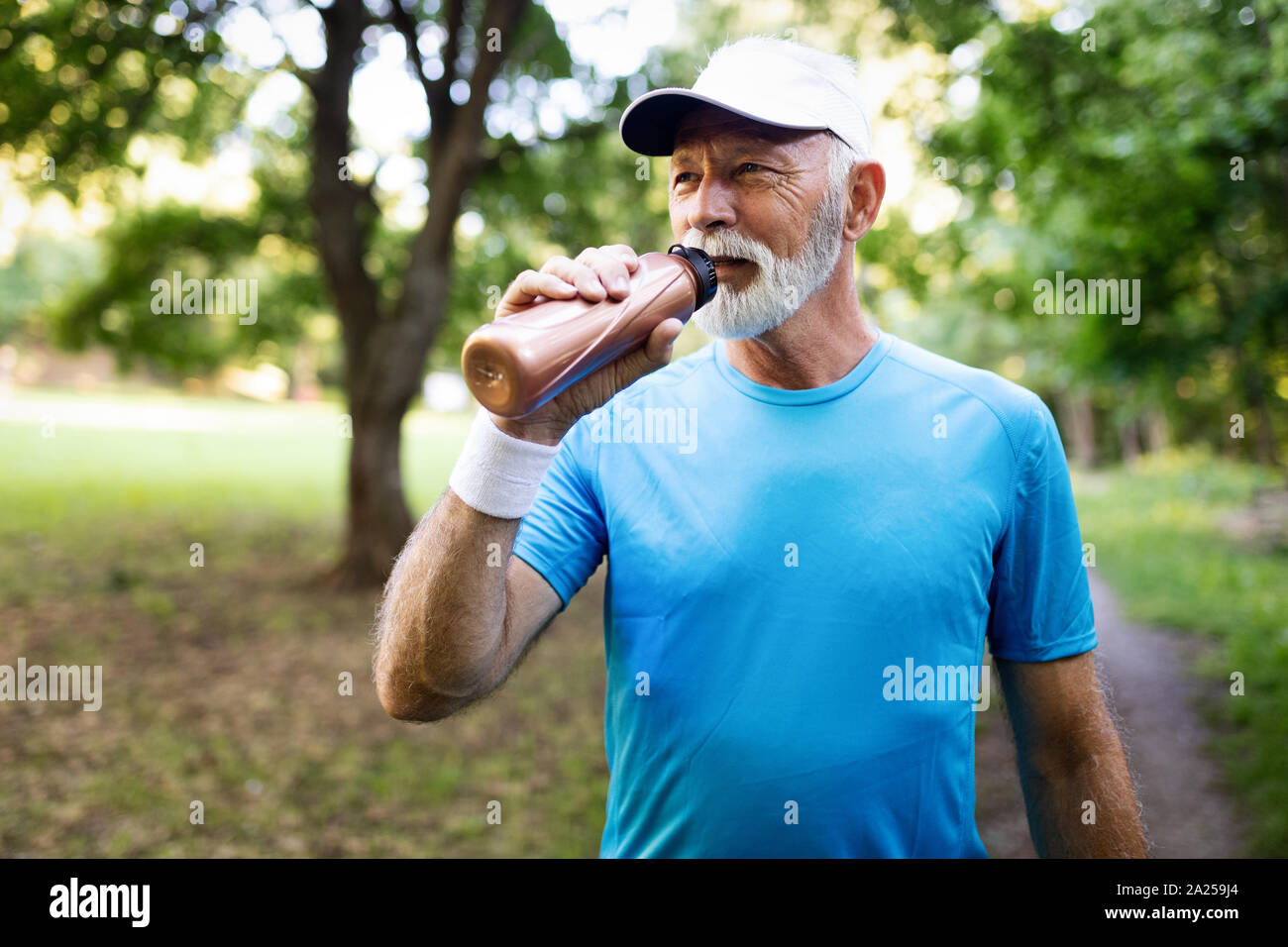 Park run exercise older person hi-res stock photography and images - Alamy