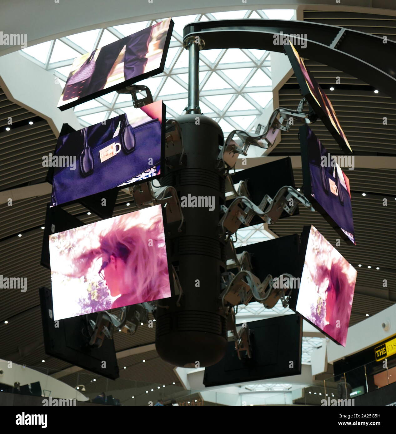 A bank of digital television screens in the departures terminal of Rome ...