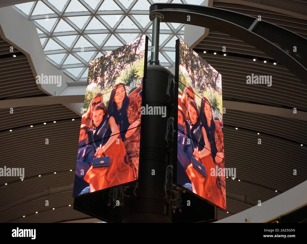A bank of digital television screens in the departures terminal of Rome ...