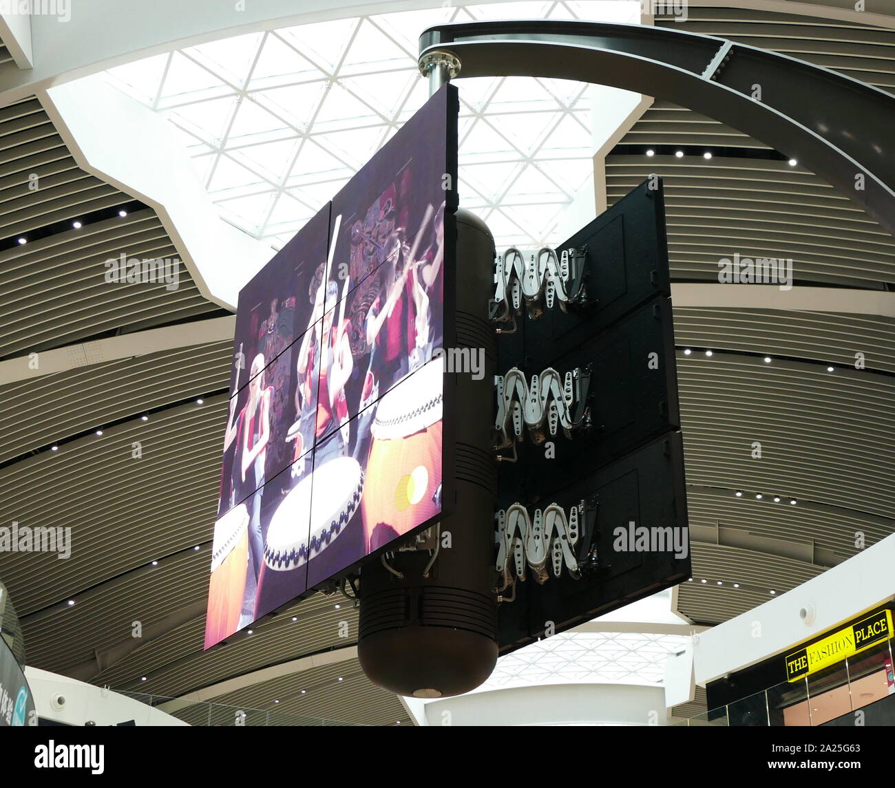 A bank of digital television screens in the departures terminal of Rome ...