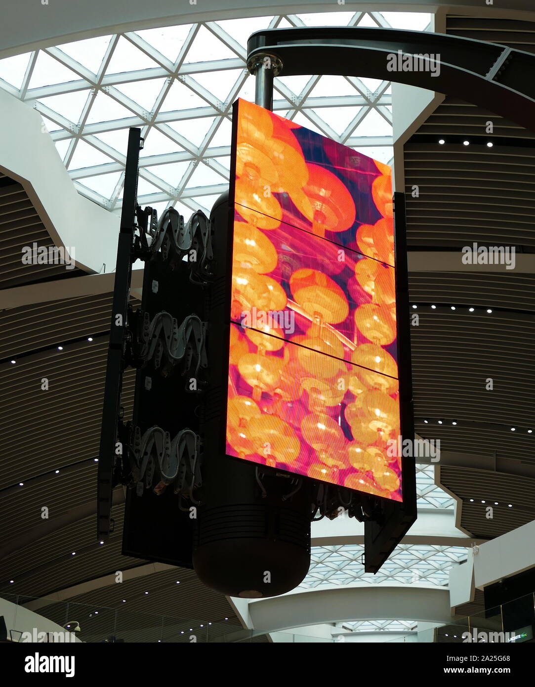 A bank of digital television screens in the departures terminal of Rome ...